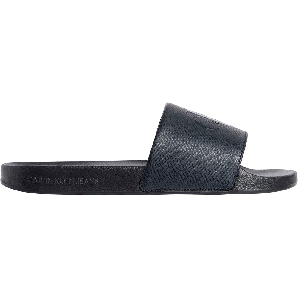 Calvin klein jeans AOP slides Black | Dressinn